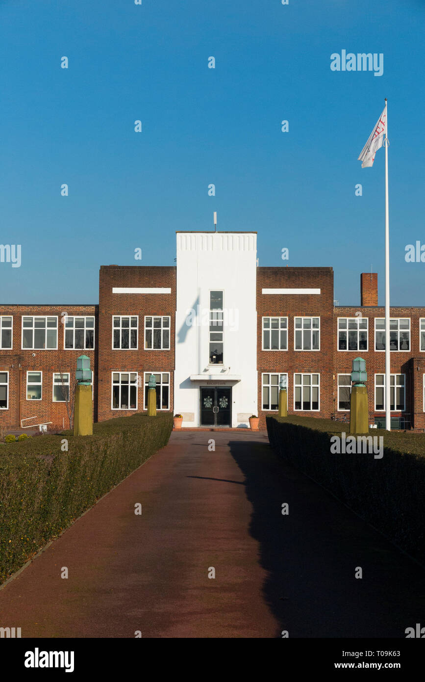 Flag flying school building entrance hi-res stock photography and ...