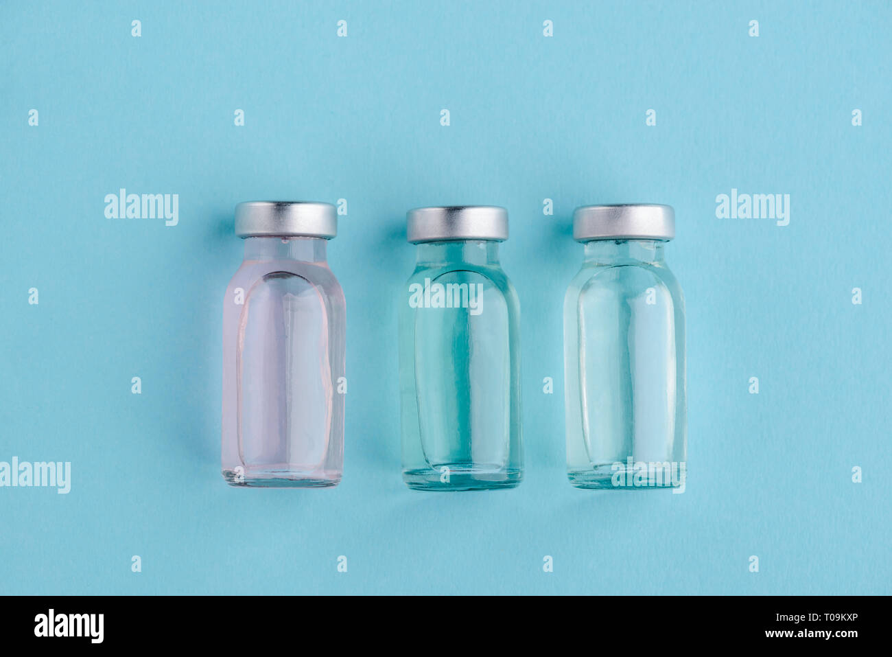 Three vials of different medicines Stock Photo - Alamy