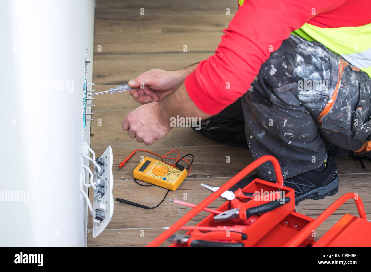 Hand of an electrician, electrician at work Stock Photo - Alamy