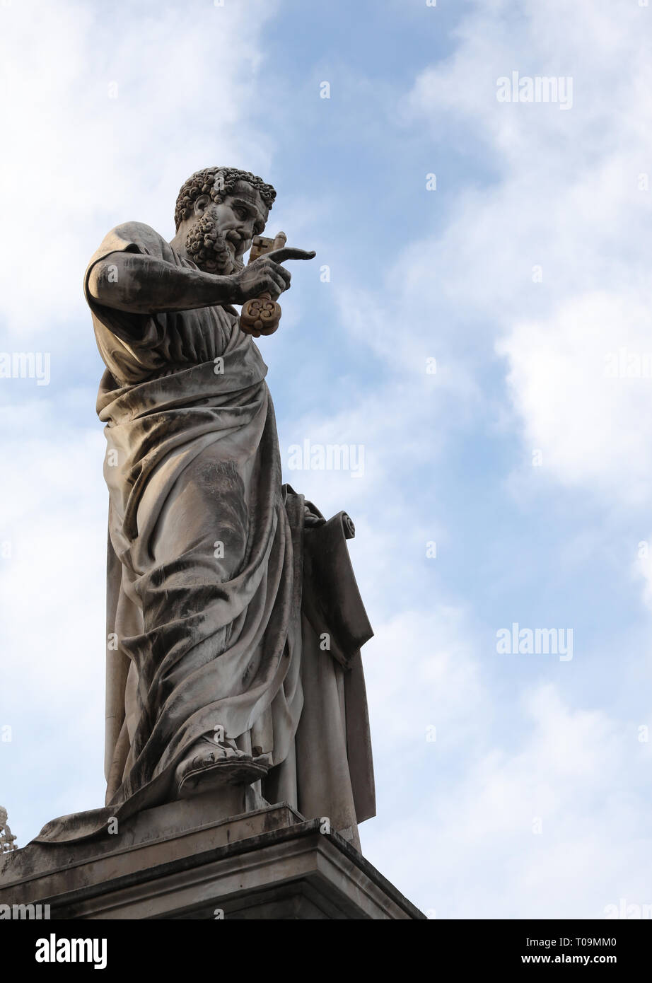 ancient Statue of Saint Peter with beard and the keys in in the square ...