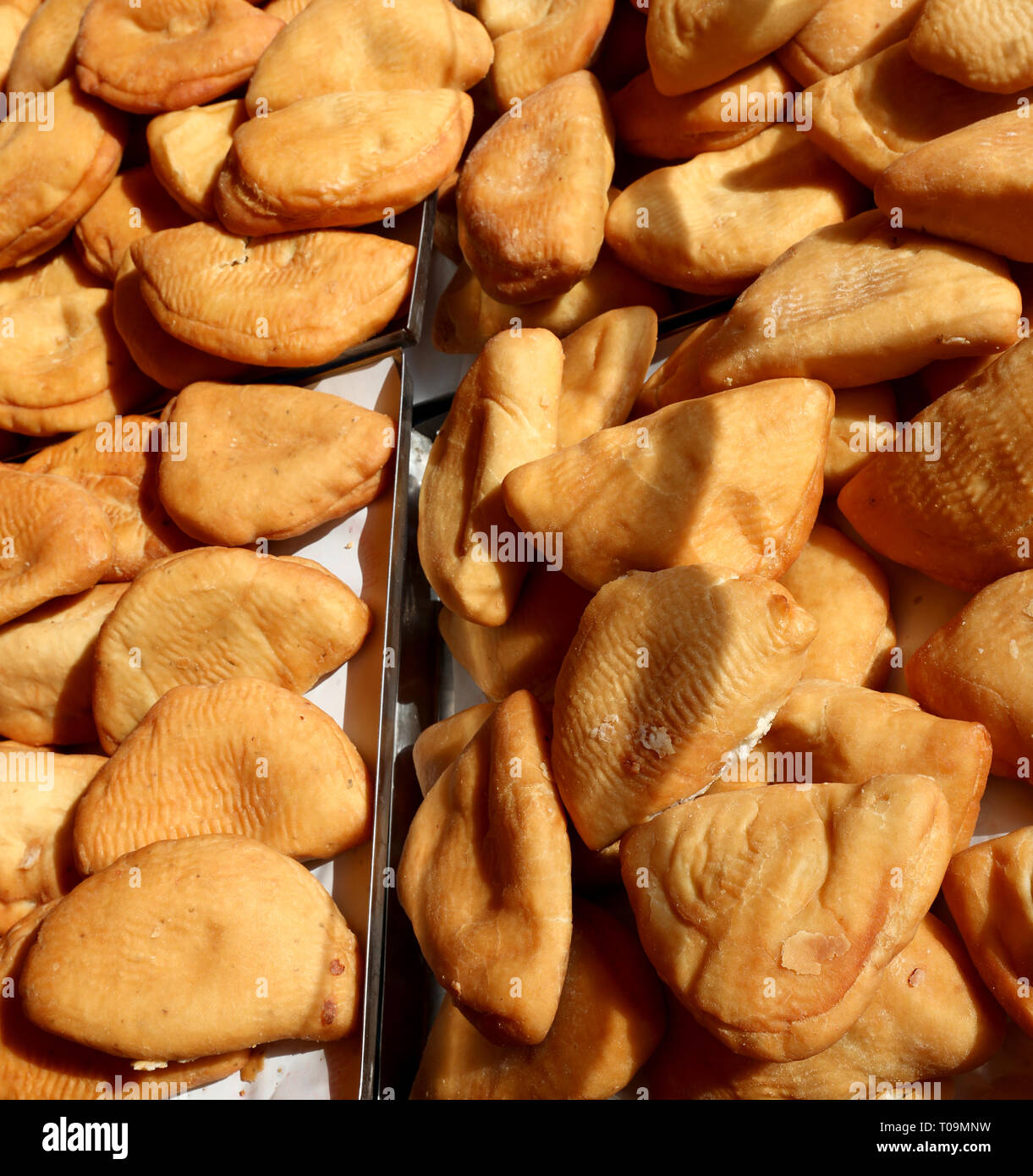 typical Italian food called Panzerotti maked with mozzarella cheese and ...