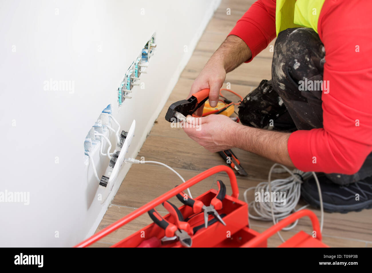 Hand of an electrician, electrician at work Stock Photo - Alamy