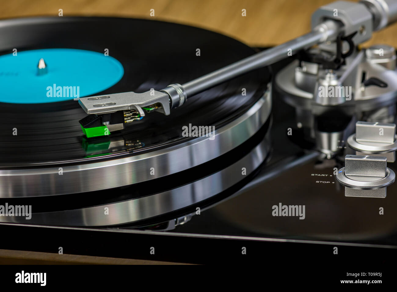 nice retro record player with spinning record Stock Photo - Alamy
