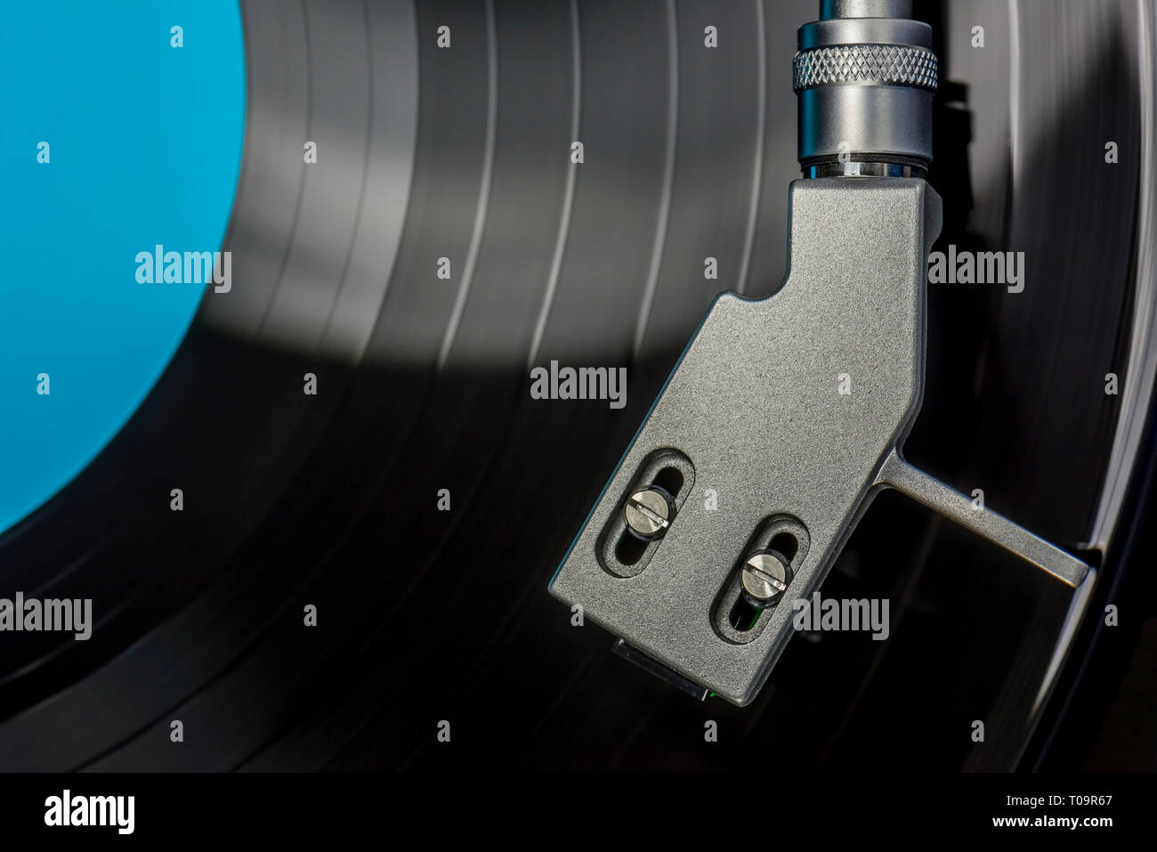 top view of a headshell from a record player while playing record ...