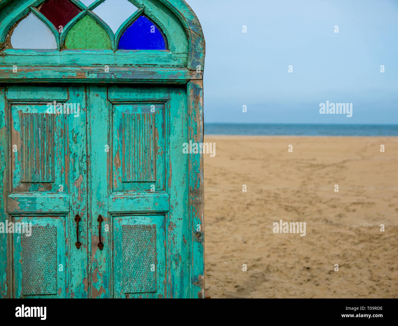 old wooden door leading to a beautiful beach Stock Photo - Alamy