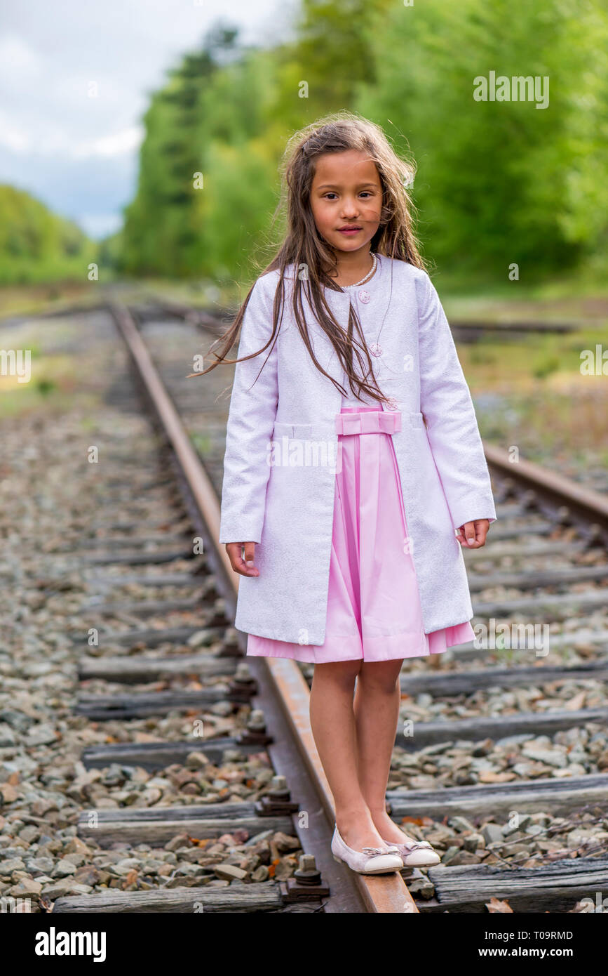 Standing on rail hi-res stock photography and images - Alamy
