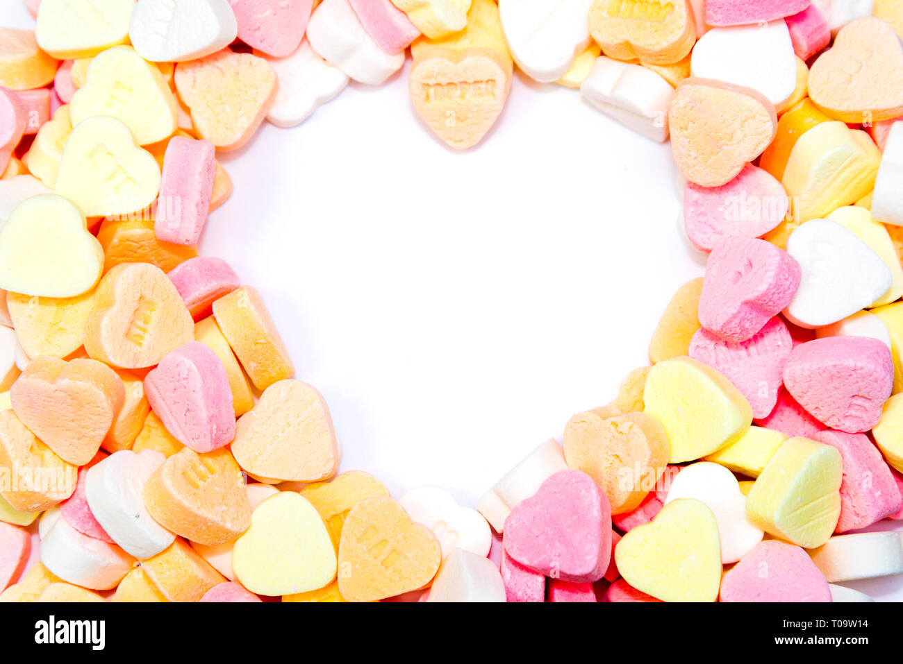 heart shaped candies with heart shaped white background Stock Photo - Alamy
