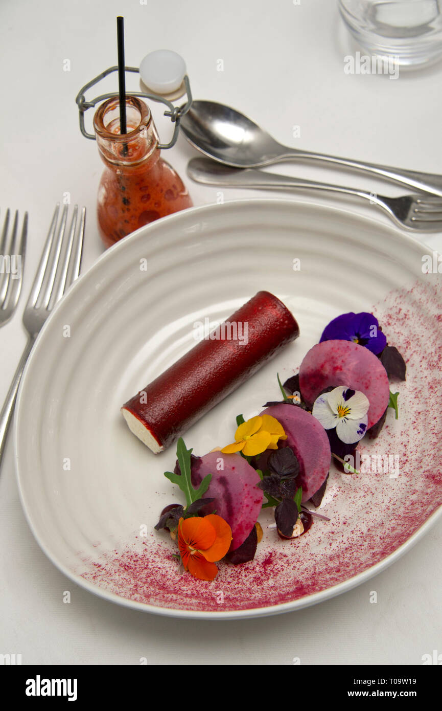Goats cheese mousse with barbecue beetroot, hazelnuts and beetroot and ...