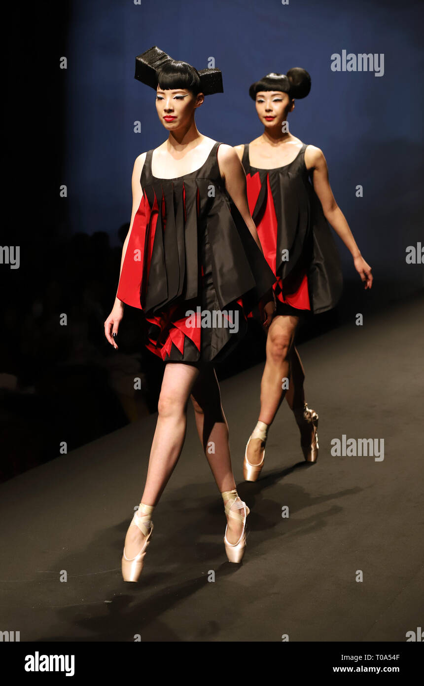 Tokyo, Japan. 18th Mar, 2019. Models display creations of Japanese ...