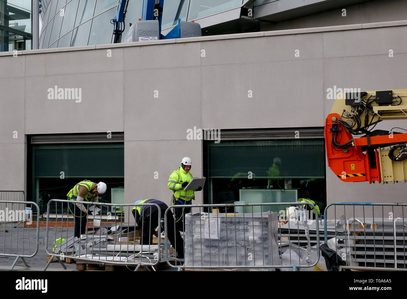 Workers are seen finalizing Tottenham Hotspur's new stadium. The ...