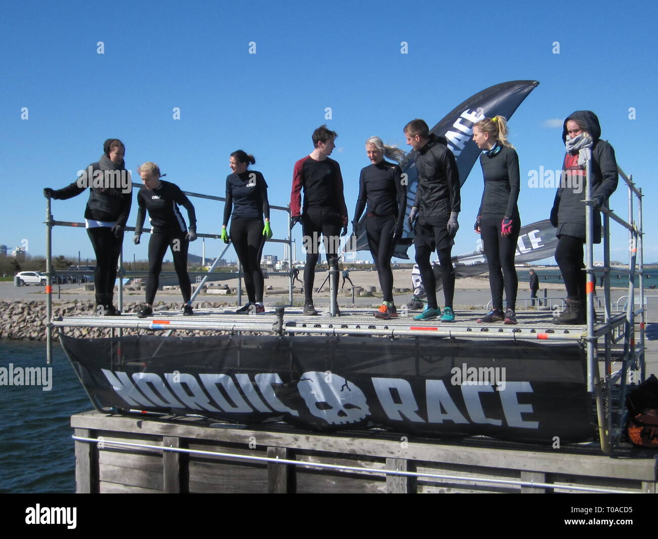 Active people during extreme obstacle course in boot camp Stock Photo ...