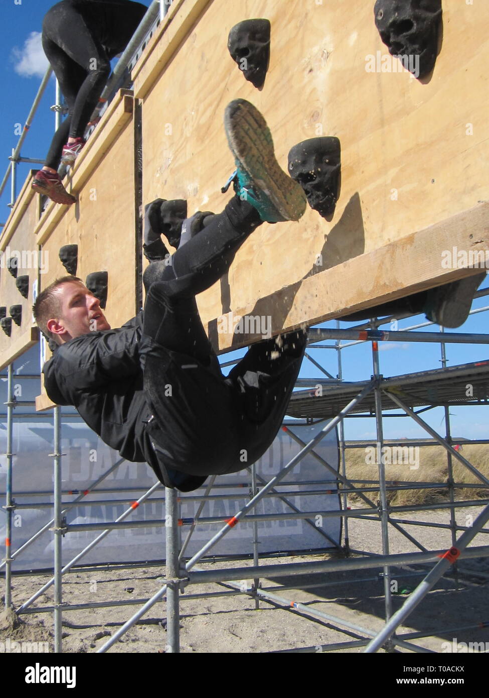 Active people during extreme obstacle course in boot camp Stock Photo ...