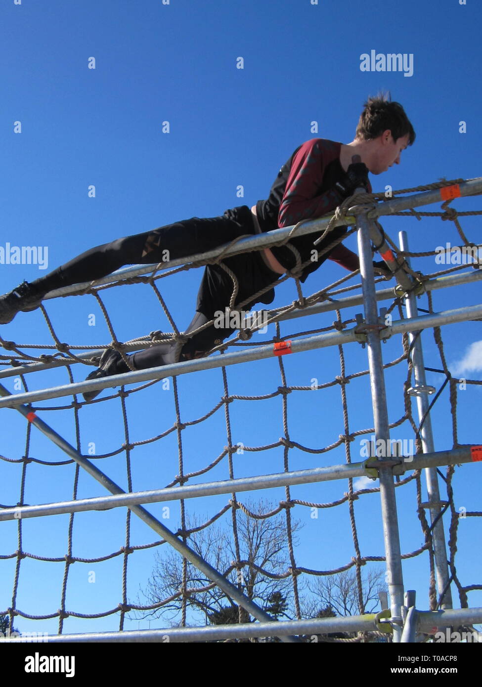 Active people during extreme obstacle course in boot camp Stock Photo ...