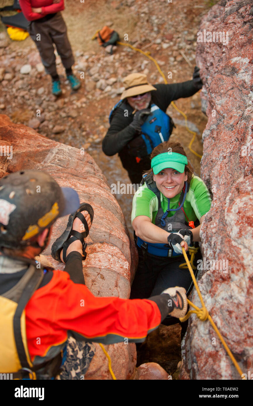 Portrait smiling woman climbing hi-res stock photography and images - Alamy