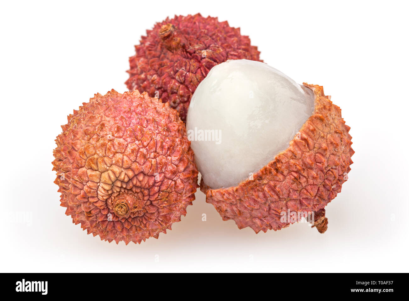 Three lychees isolated on white background Stock Photo - Alamy