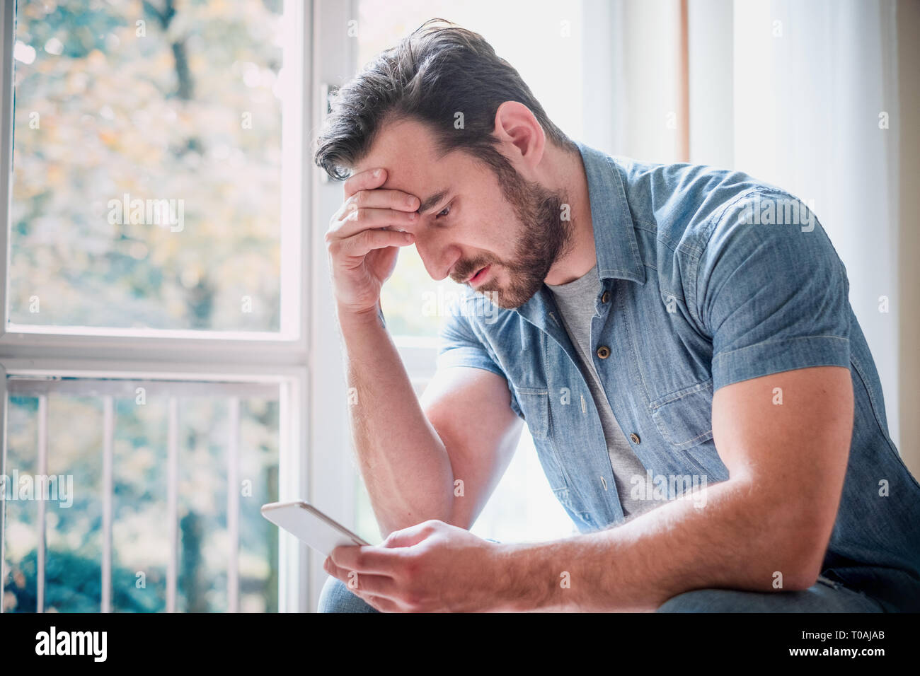 Jealous man hi-res stock photography and images - Alamy