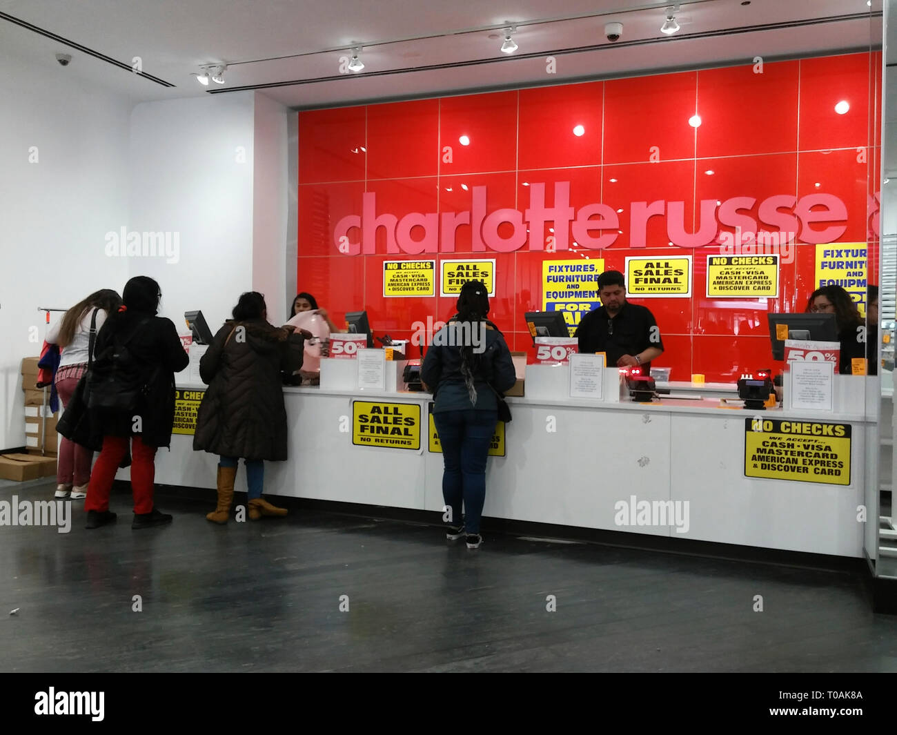 Customers at the cashiers in the Charlotte Russe store in Herald Square ...