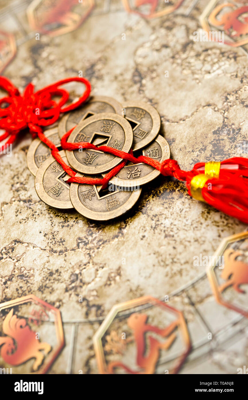 detail of an Chinese astrology wheel and old traditional Feng Shui ...