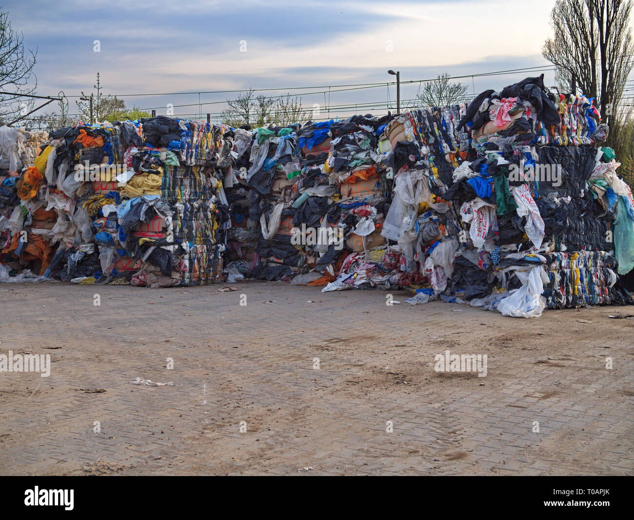 Trash wall, plastic and papers collected for recycling Stock Photo - Alamy