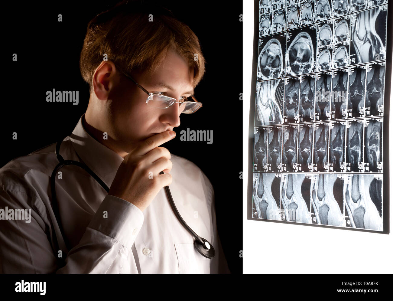 Young puzzled doctor thinking about the diagnosis Stock Photo - Alamy