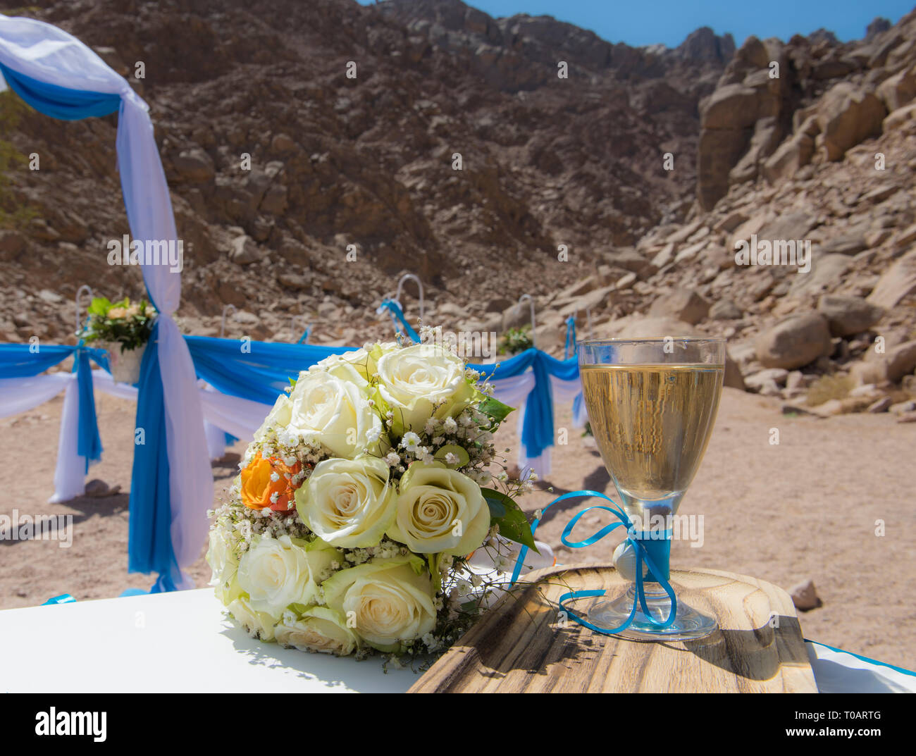 Setup of wedding day marriage ceremony with flower bouquet and ...