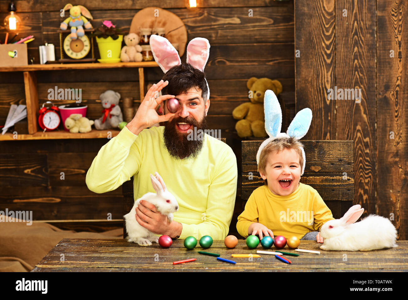 Father and son painting Easter eggs Stock Photo - Alamy