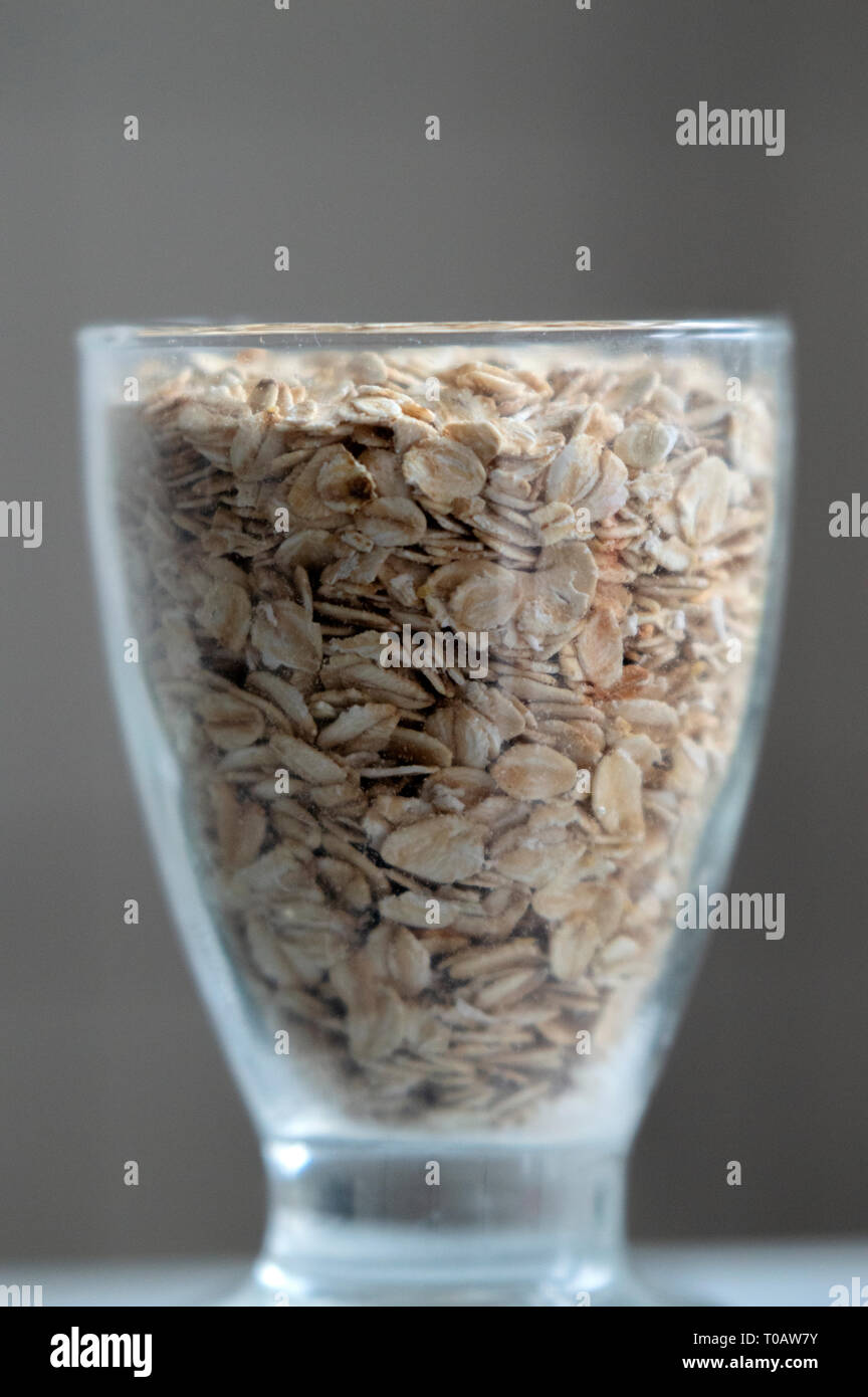Raw oats in a glass hi-res stock photography and images - Alamy