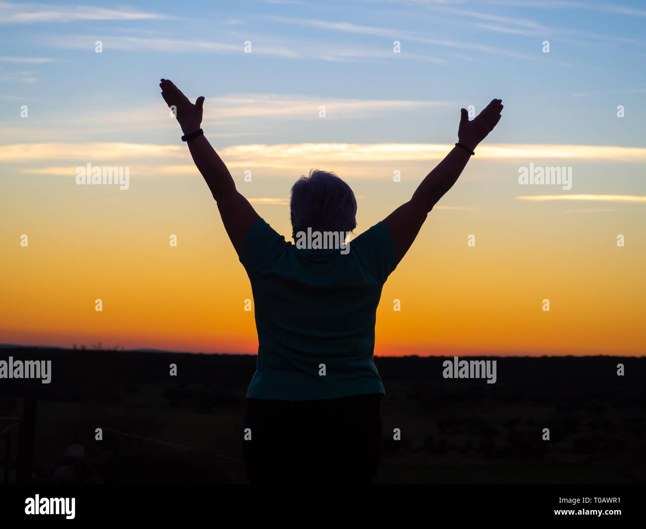 Mature woman sunset hi-res stock photography and images - Alamy