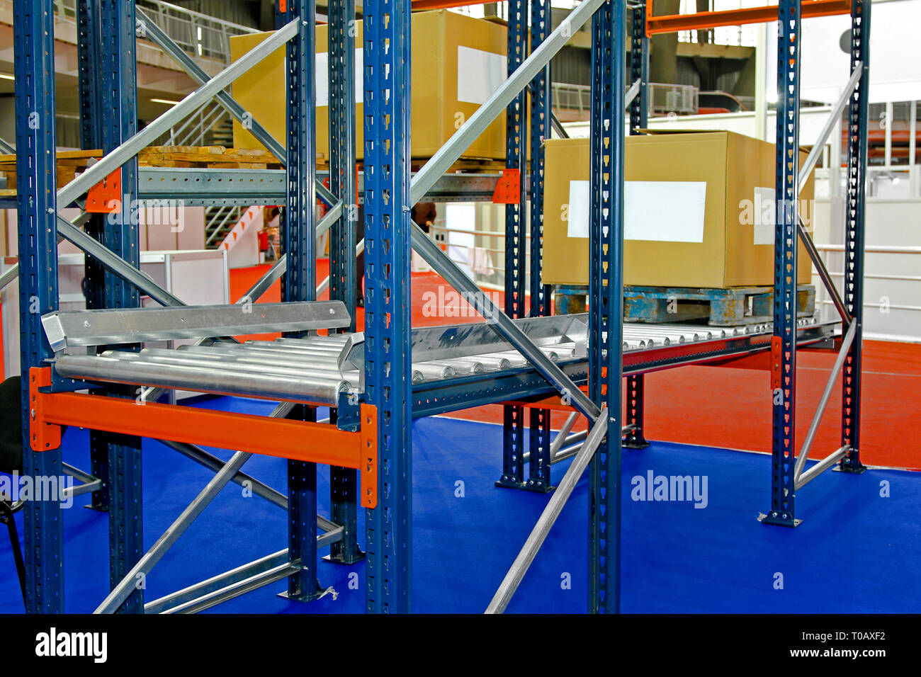 Gravity Flow Conveyor at Shelving System in Distribution Warehouse ...