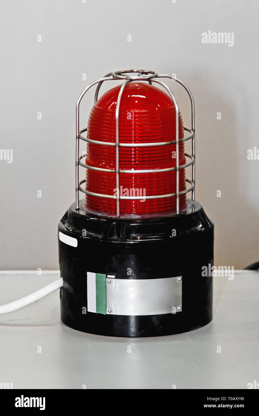 Red Strobe Hazard Flashing Light With Protection Stock Photo - Alamy