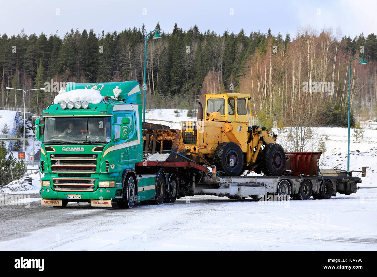 Salo, Finland - March 9, 2019: Green Scania truck with Noteboom low ...