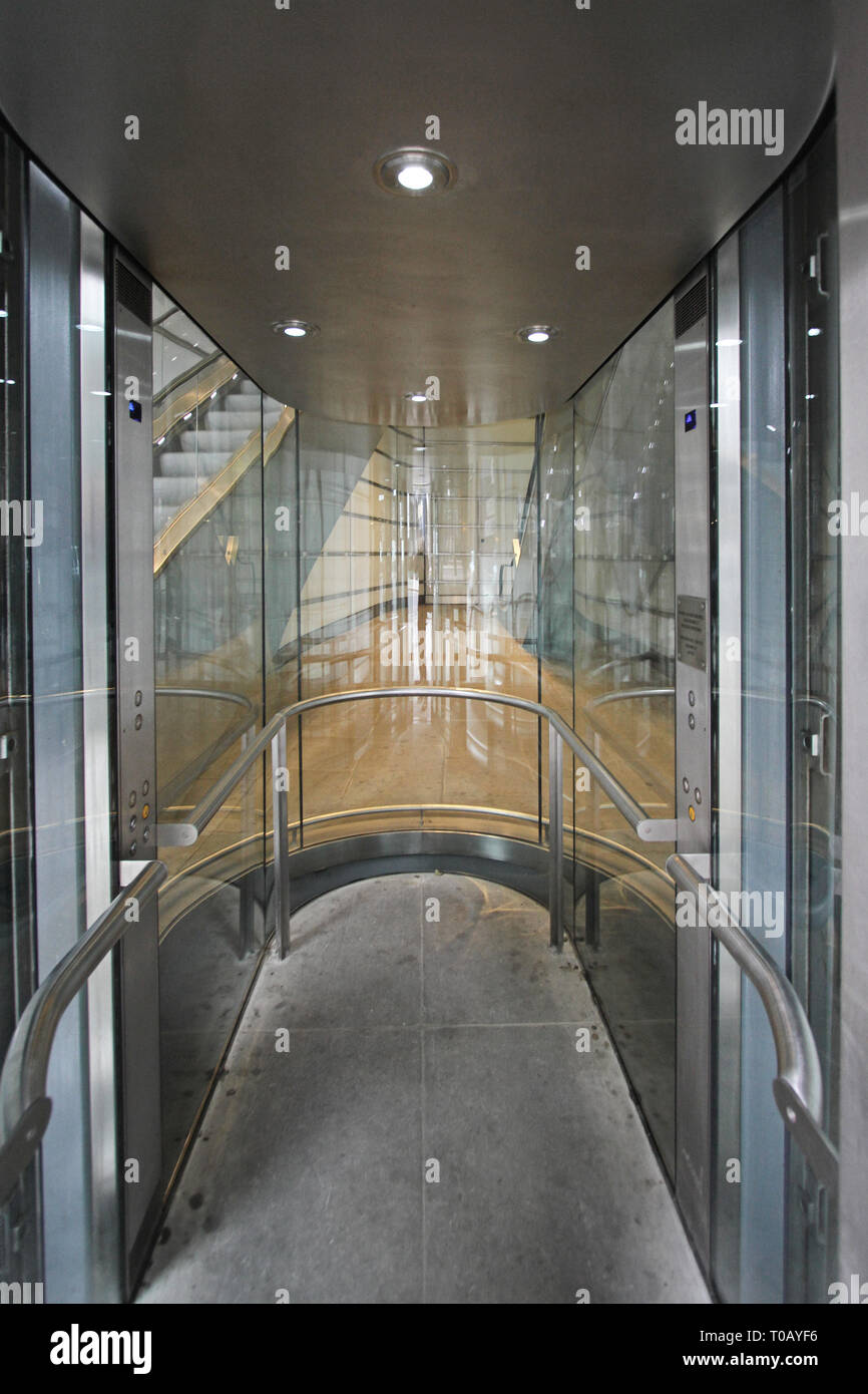 Modern Oval Shape Glass Lift Elevator in London Stock Photo - Alamy