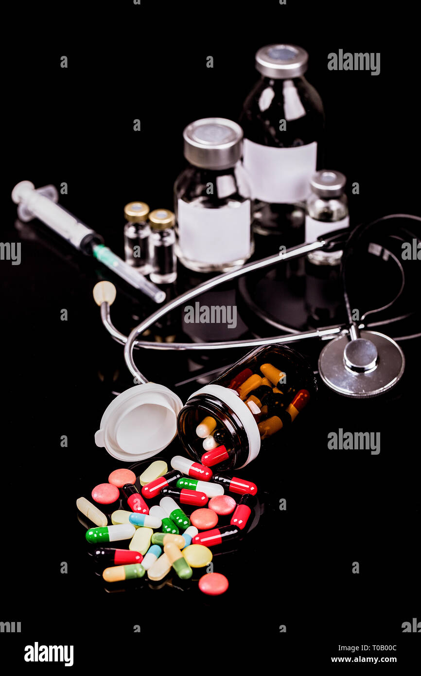 Medical capules, vials for injection with a syringe and ampules on ...