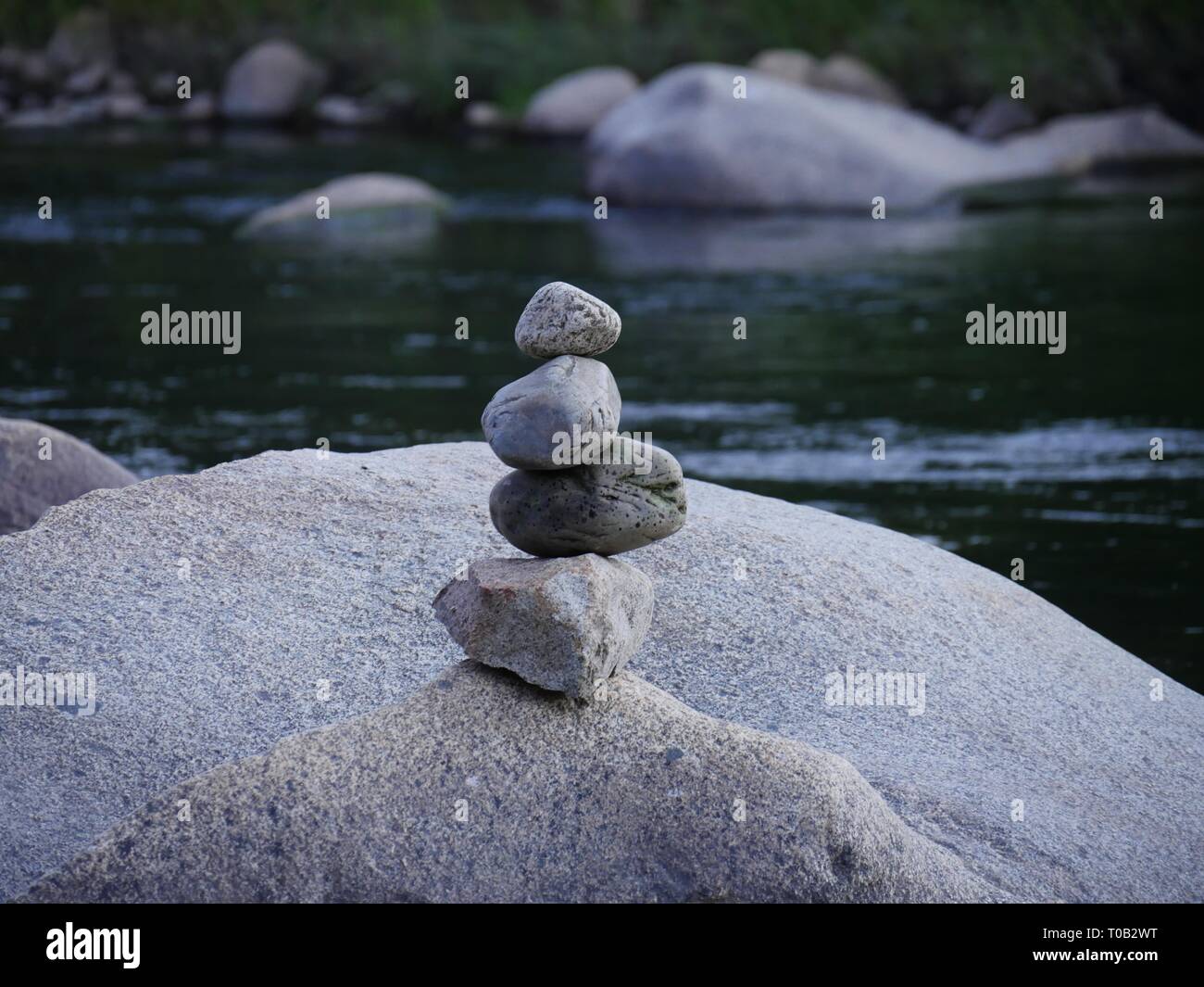 On each other stacked river stones hi-res stock photography and images ...