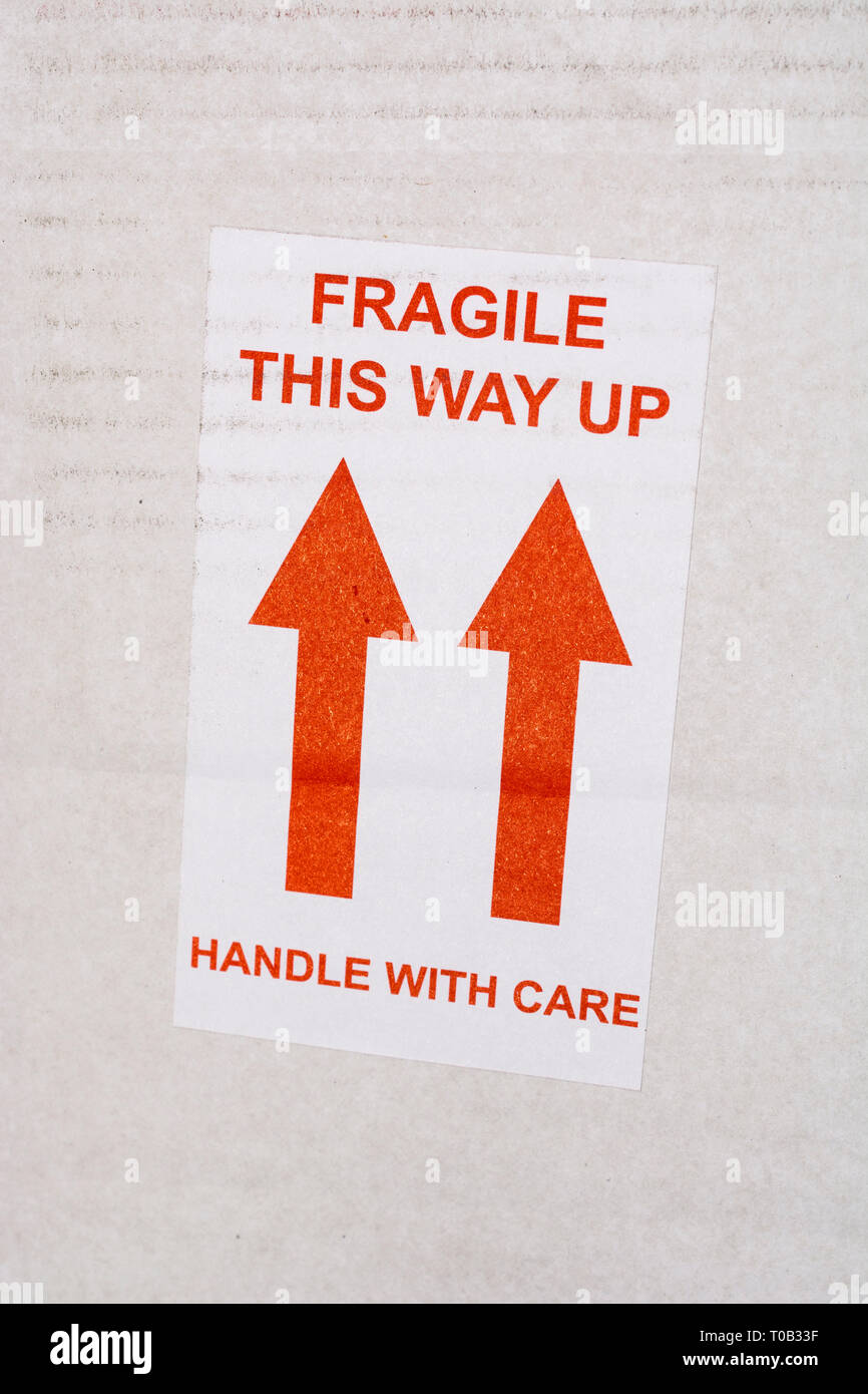 'FRAGILE' label on the side of a cardboard carton / box Stock Photo - Alamy