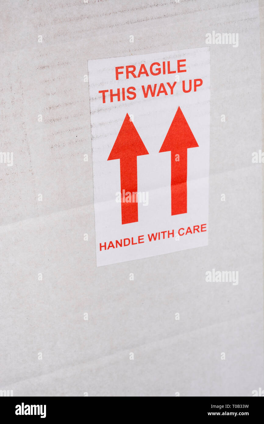 'FRAGILE' label on the side of a cardboard carton / box Stock Photo - Alamy