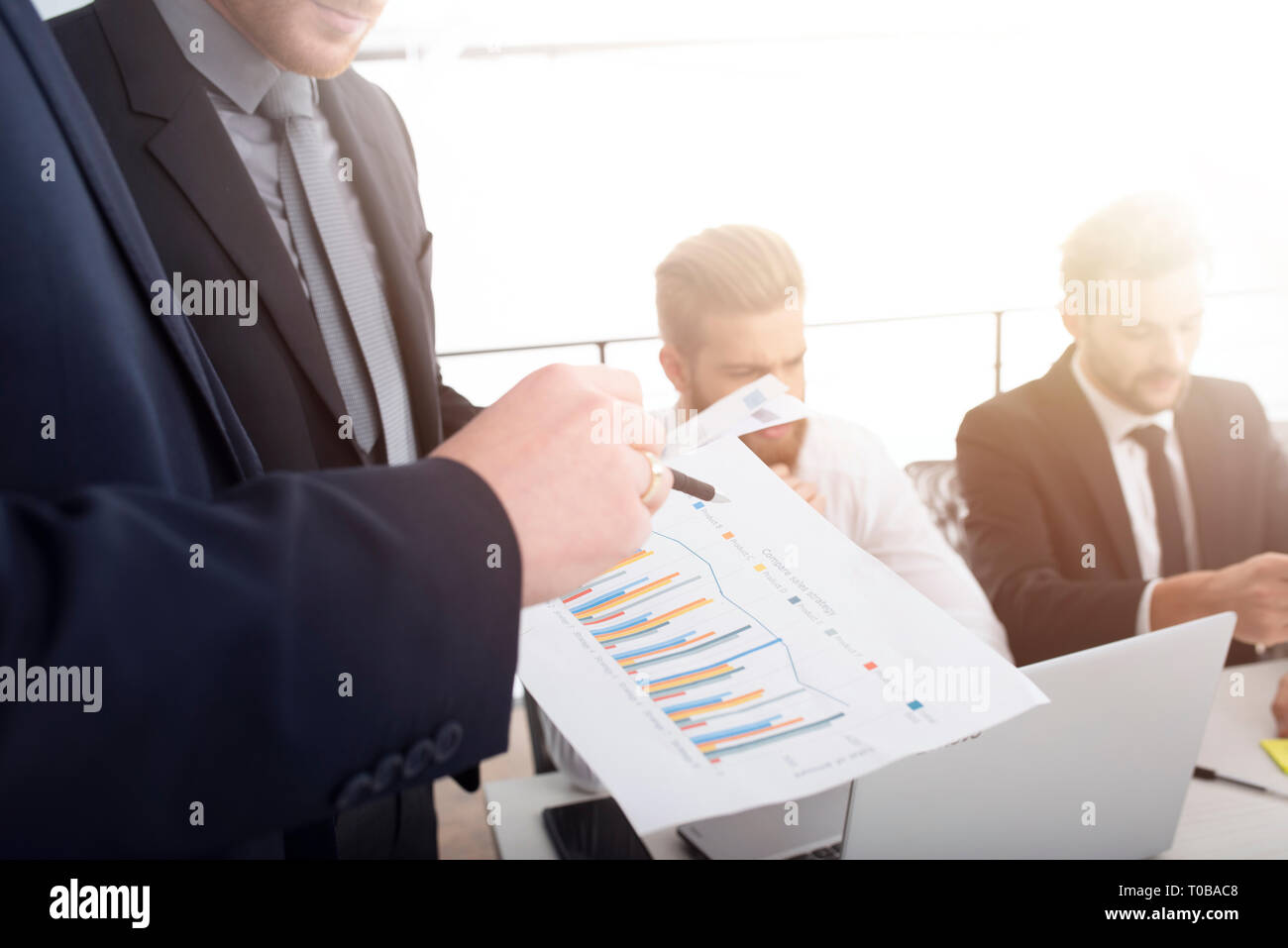 Team of business person works together on company statistics. Concept ...