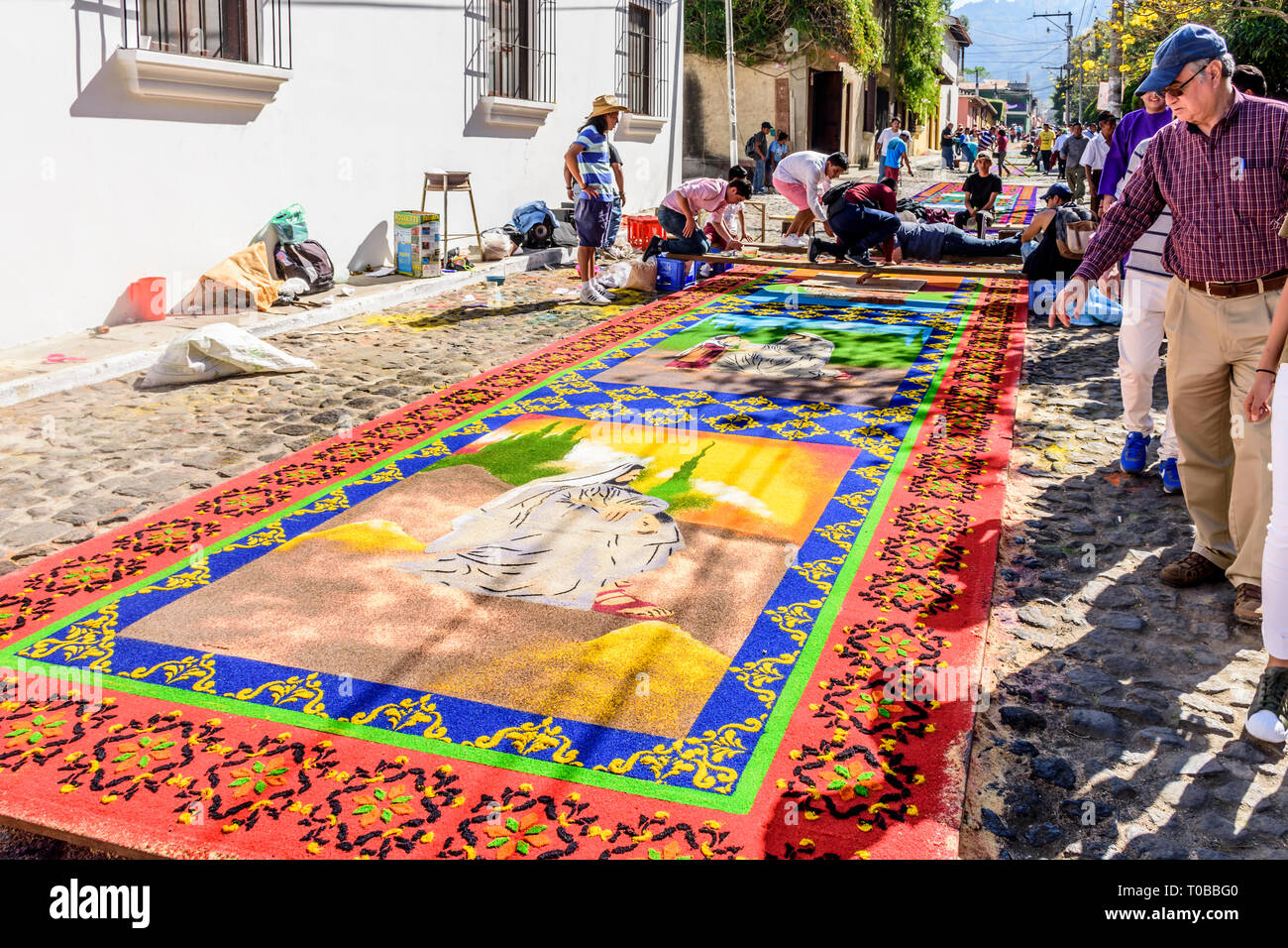 Antigua, Guatemala - March 11, 2018: People admire dyed sawdust Lent ...
