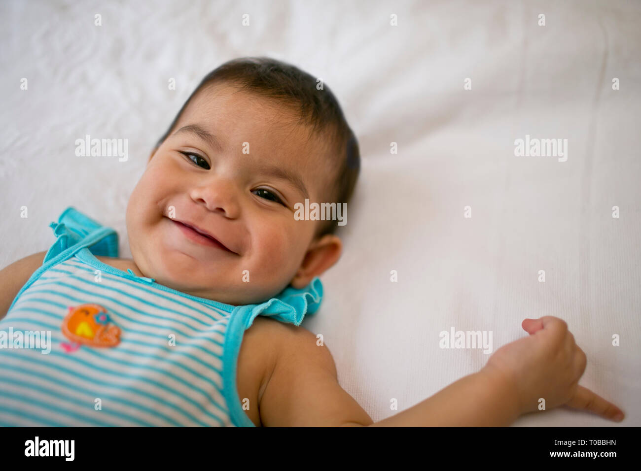 Portrait of a happy baby girl Stock Photo - Alamy