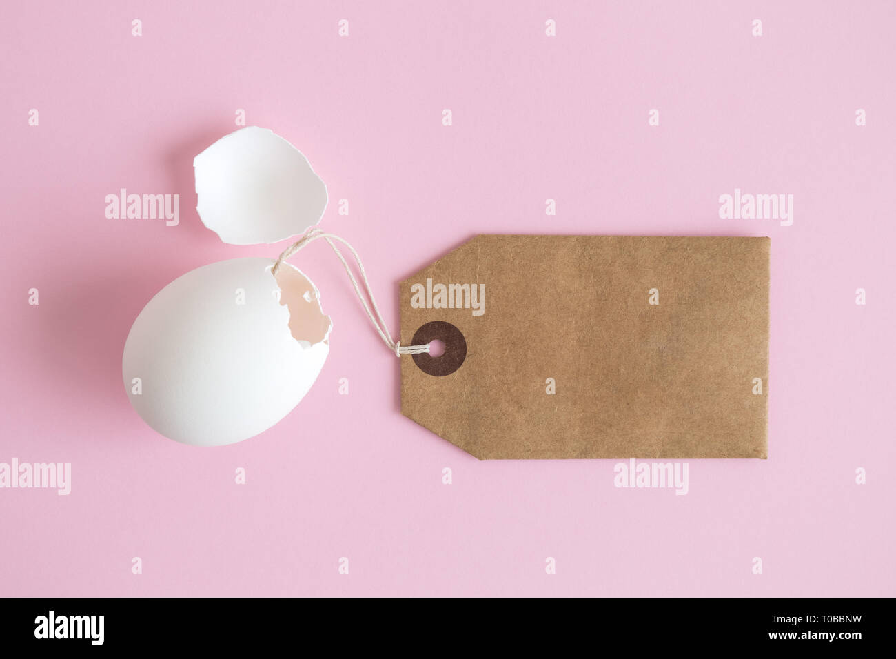 Egg shell with blank price tag minimal easter shopping creative concept ...
