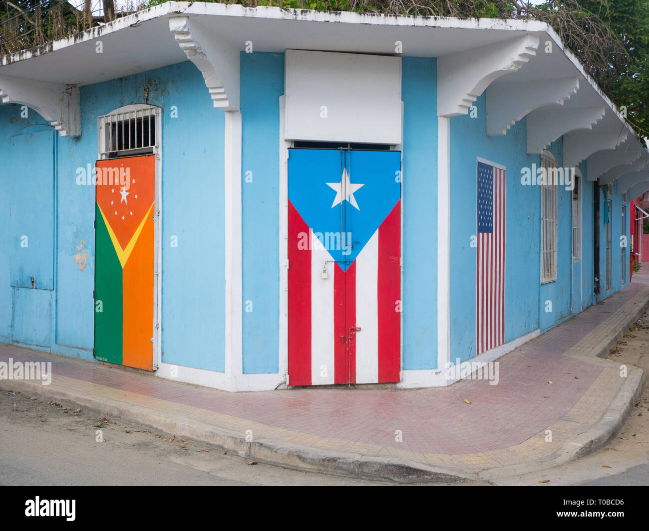 Rincon, Puerto Rico. January 2019. Wooden door with Puerto Rican flag ...