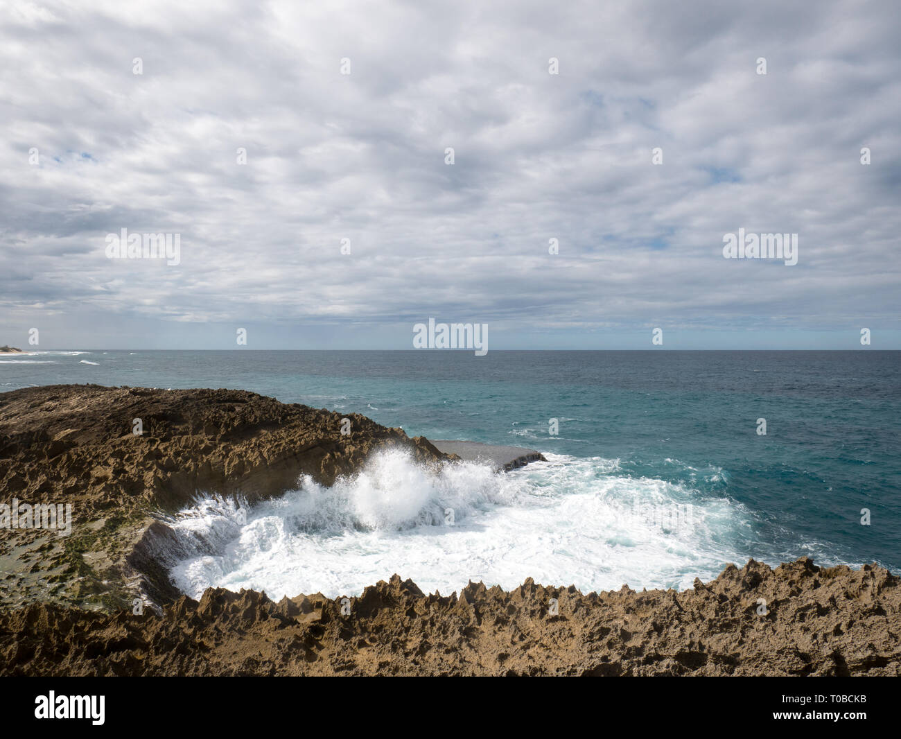 Huge waves collide against a reef near Jobos Beach in Puerto Rico, USA ...
