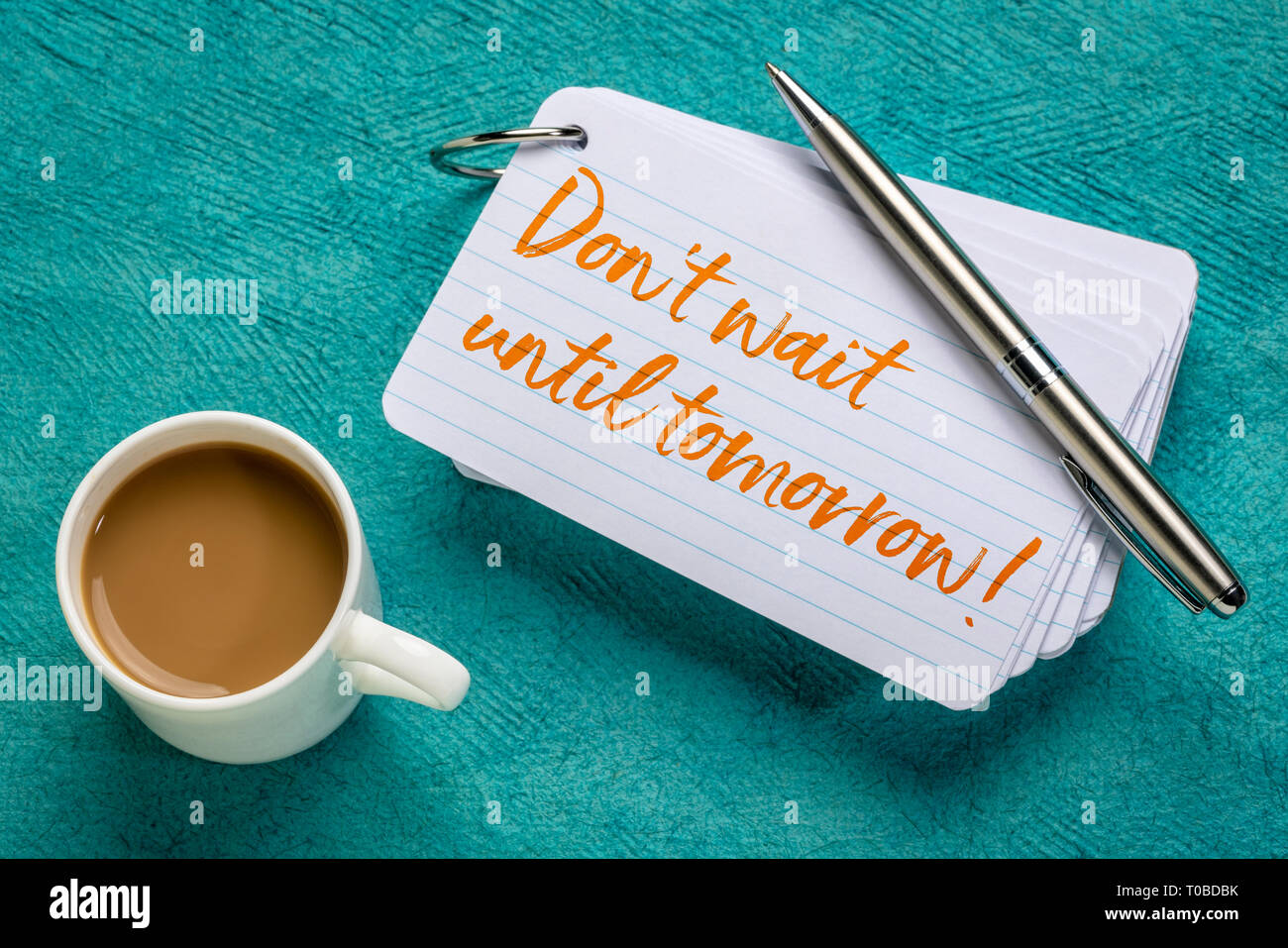 Do not wait until tomorrow - advice or reminder on a stack of index ...