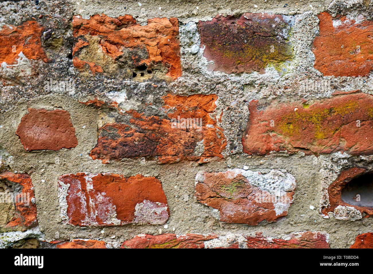 old repaired wall with brick texture Stock Photo - Alamy