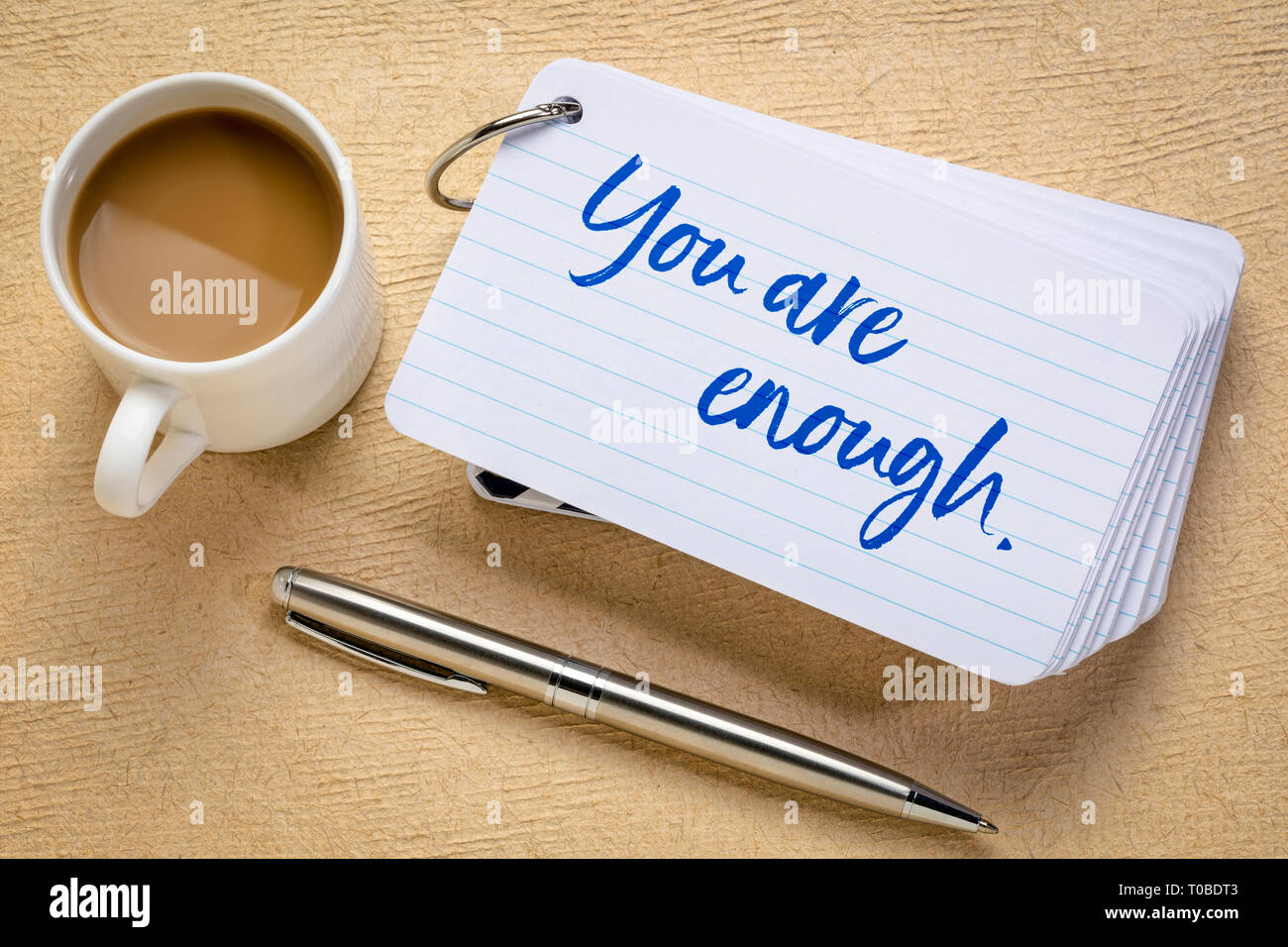you are enough concept - handwriting on a stack of index cards with a ...