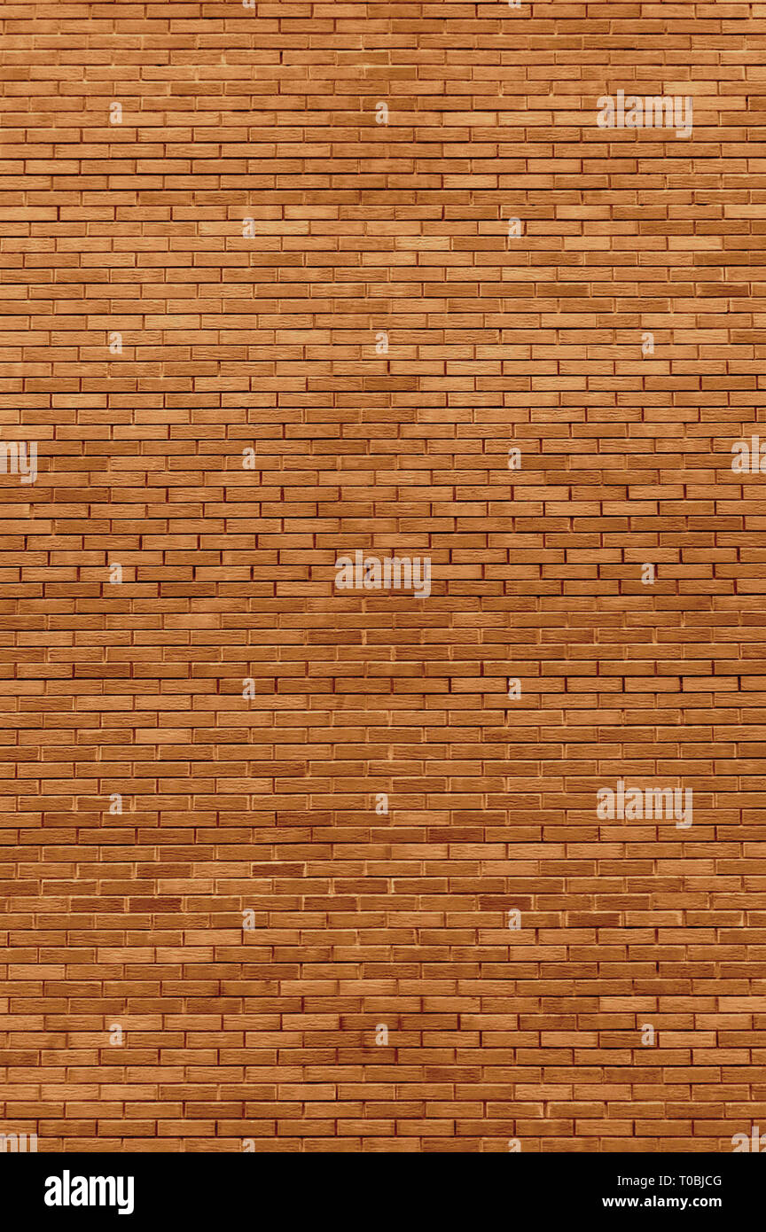 Red beige bricks stone wall decorative background closeup, vertical ...