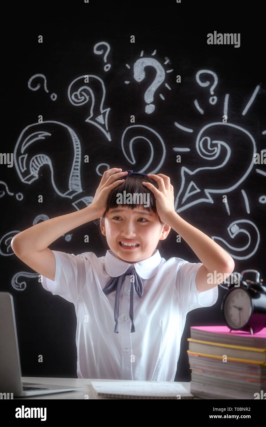 Frustration of elementary school girls Stock Photo - Alamy