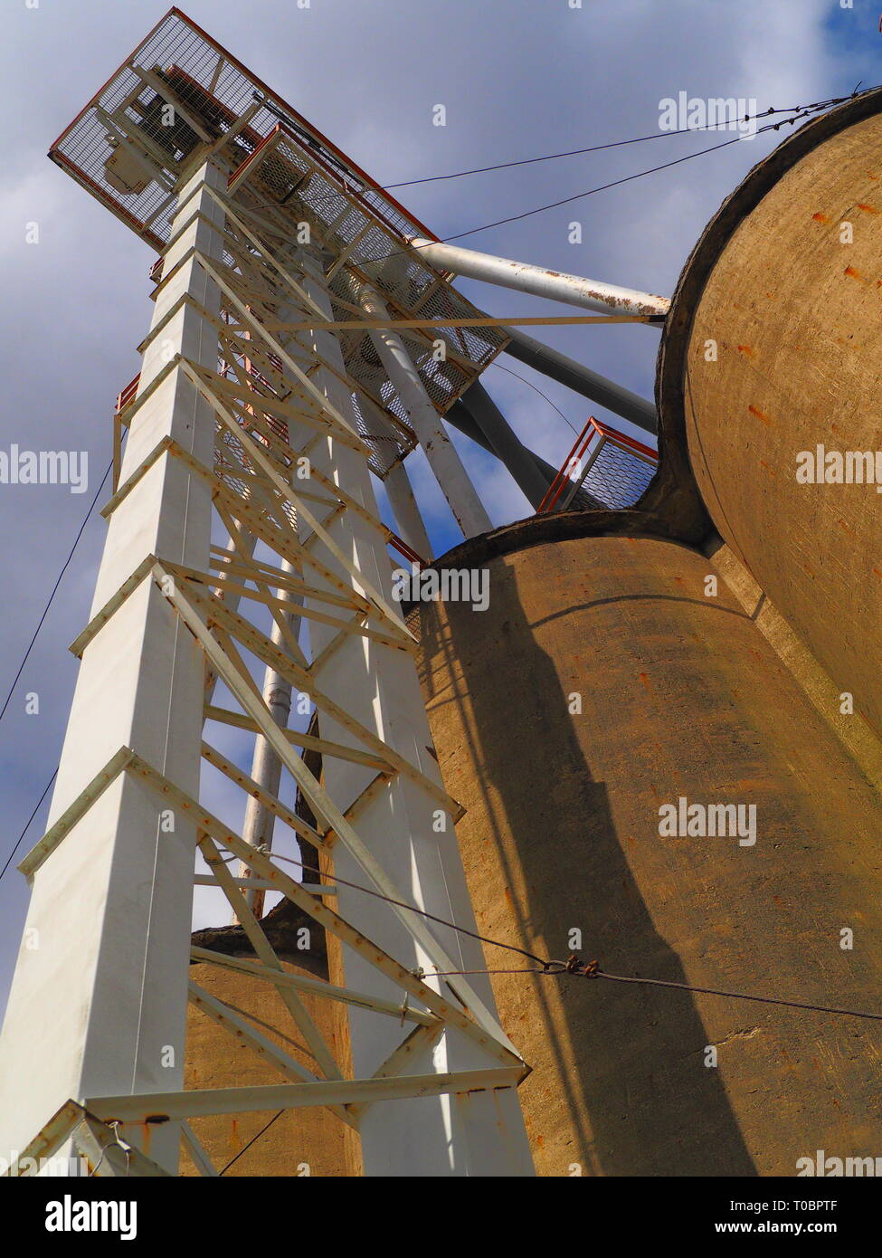 abstract of concrete grain silo with white elevator Stock Photo - Alamy