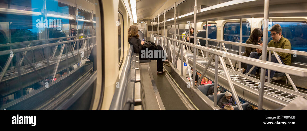 Interior panorama of an upper-deck Metra commuter train car between ...