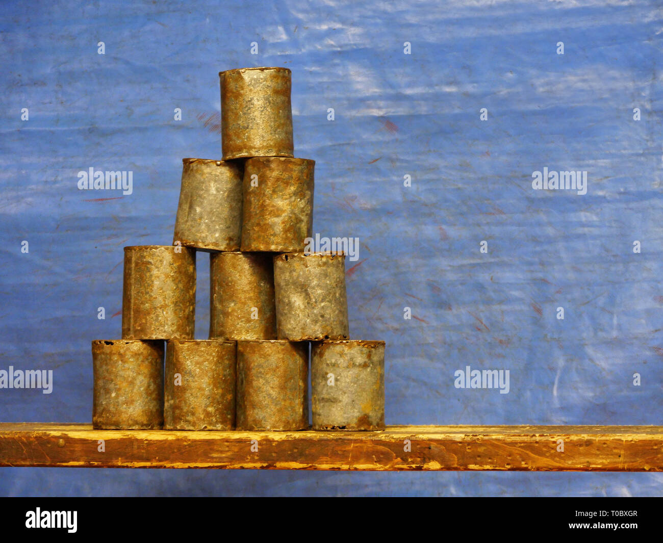 Piled up rusty cans for Tin can toss carnival vintage game Stock Photo ...